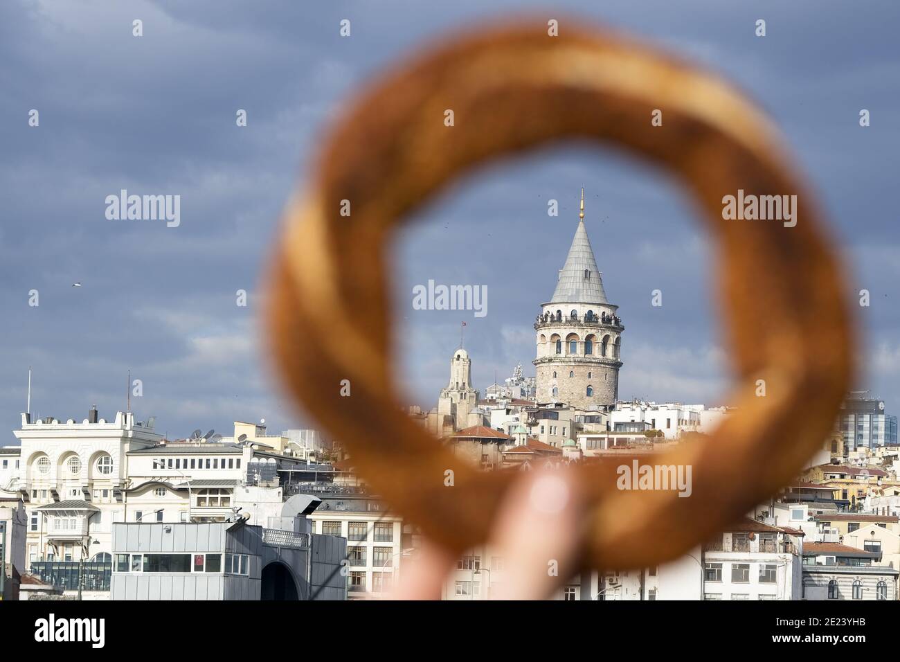 Traditional Turkish bagel simit and The Galata Tower Stock Photo - Alamy