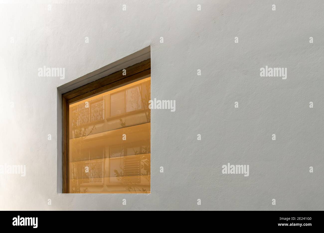 windows house reflected on the glass window on white walls. Selective ...