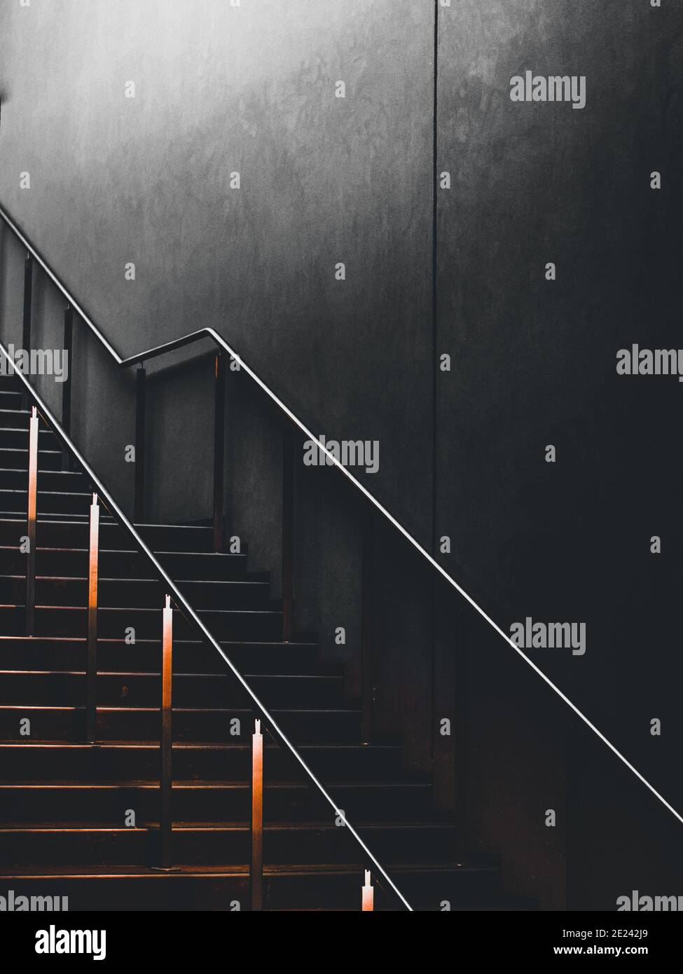 Vertical shot of underground stairs with metallic handrail Stock Photo ...