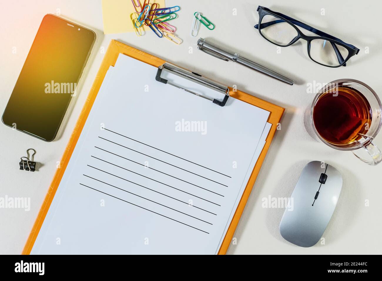 Office file folder clipboard with white paper for inscription and other ...