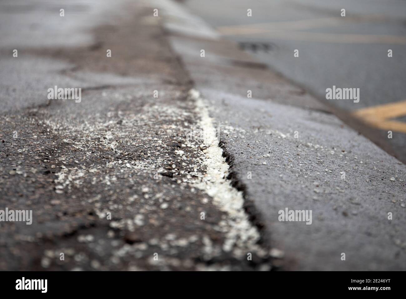 Driving part and sidewalk is sprinkled with anti-slip material. Weather ...