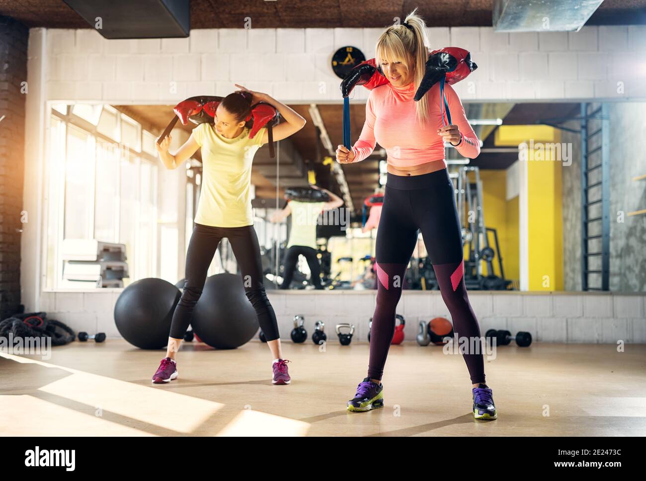 Girls flexing biceps hi-res stock photography and images - Alamy