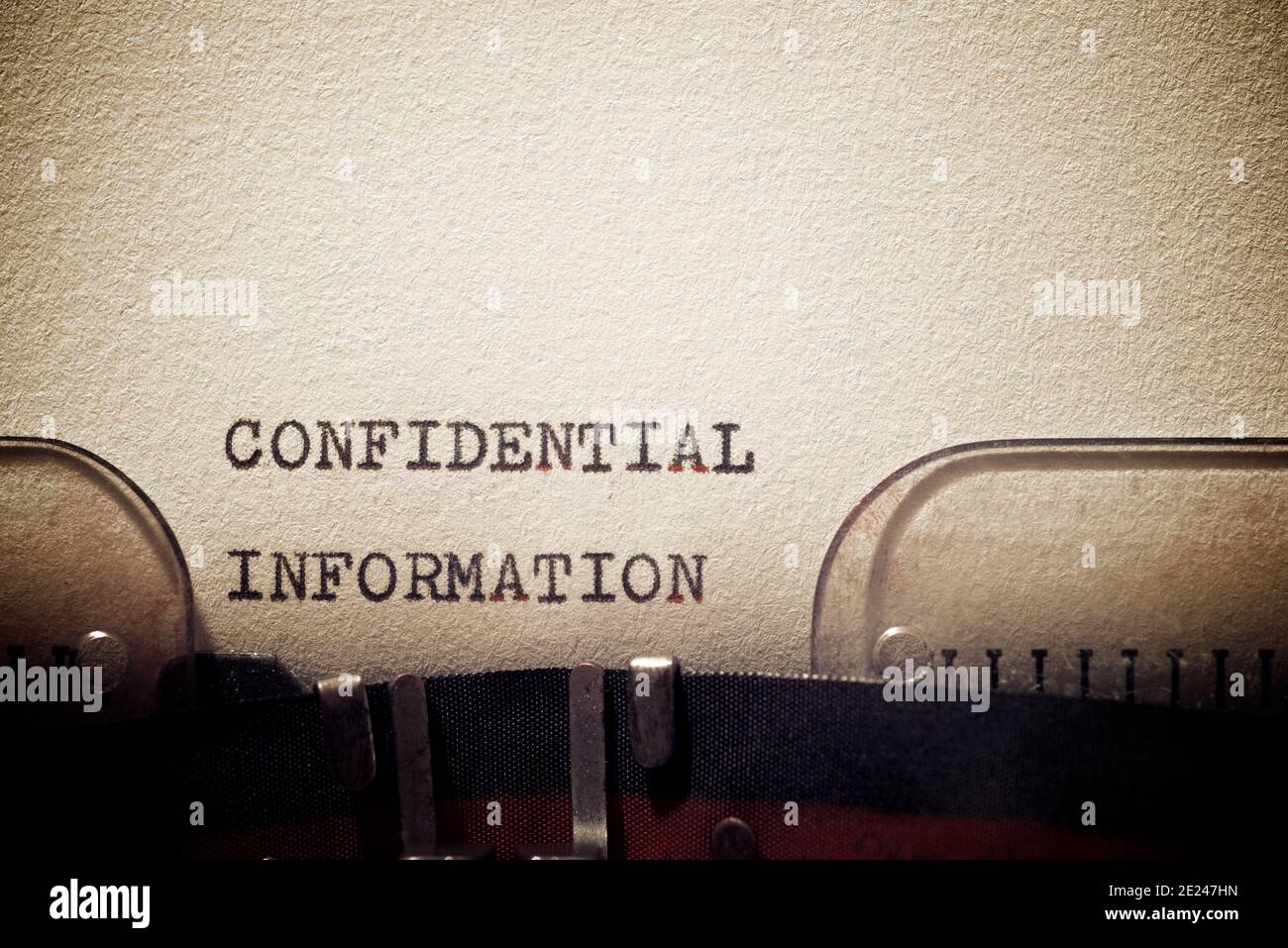 Confidential information phrase written with a typewriter Stock Photo ...