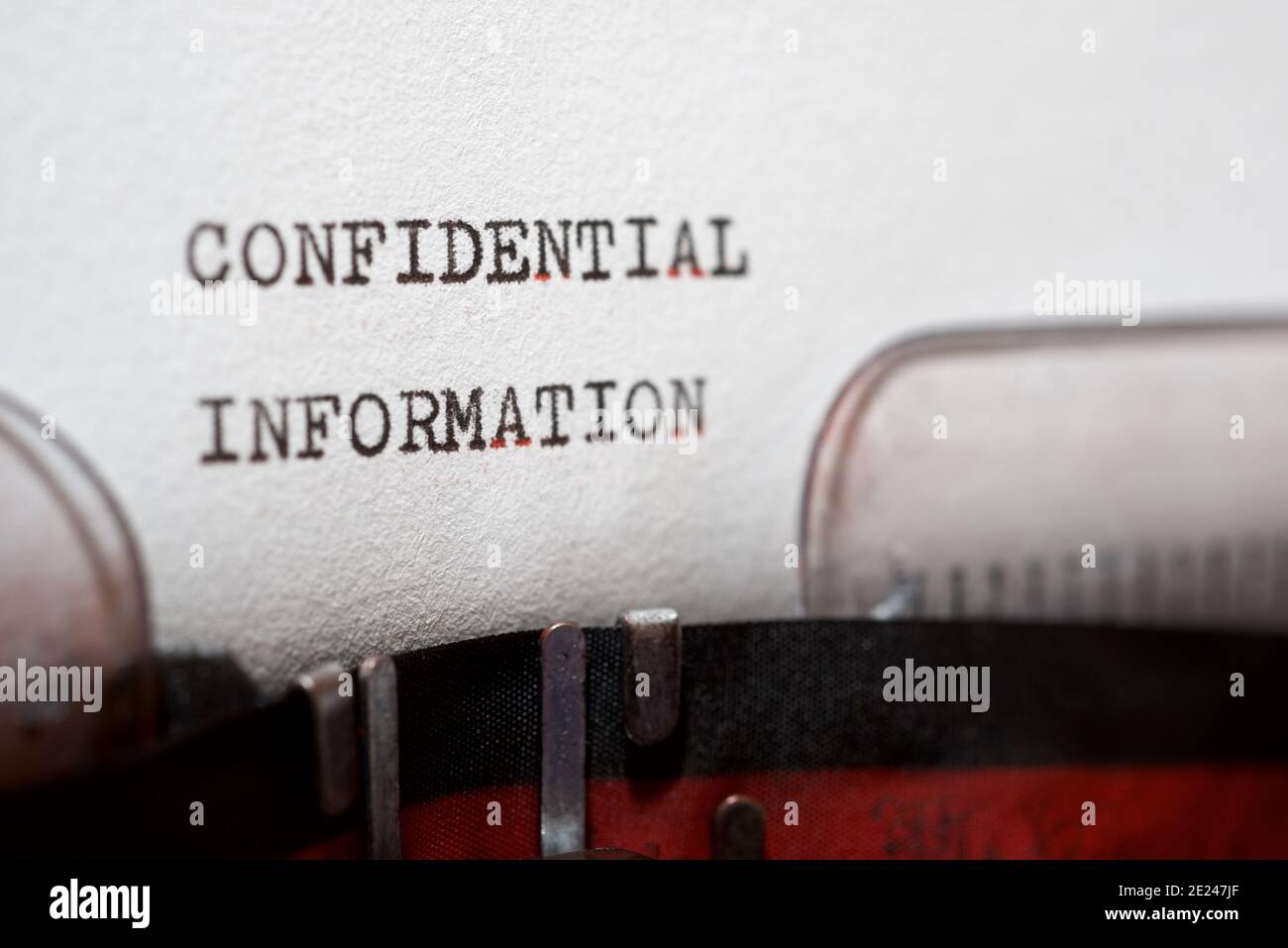 Confidential information phrase written with a typewriter Stock Photo ...