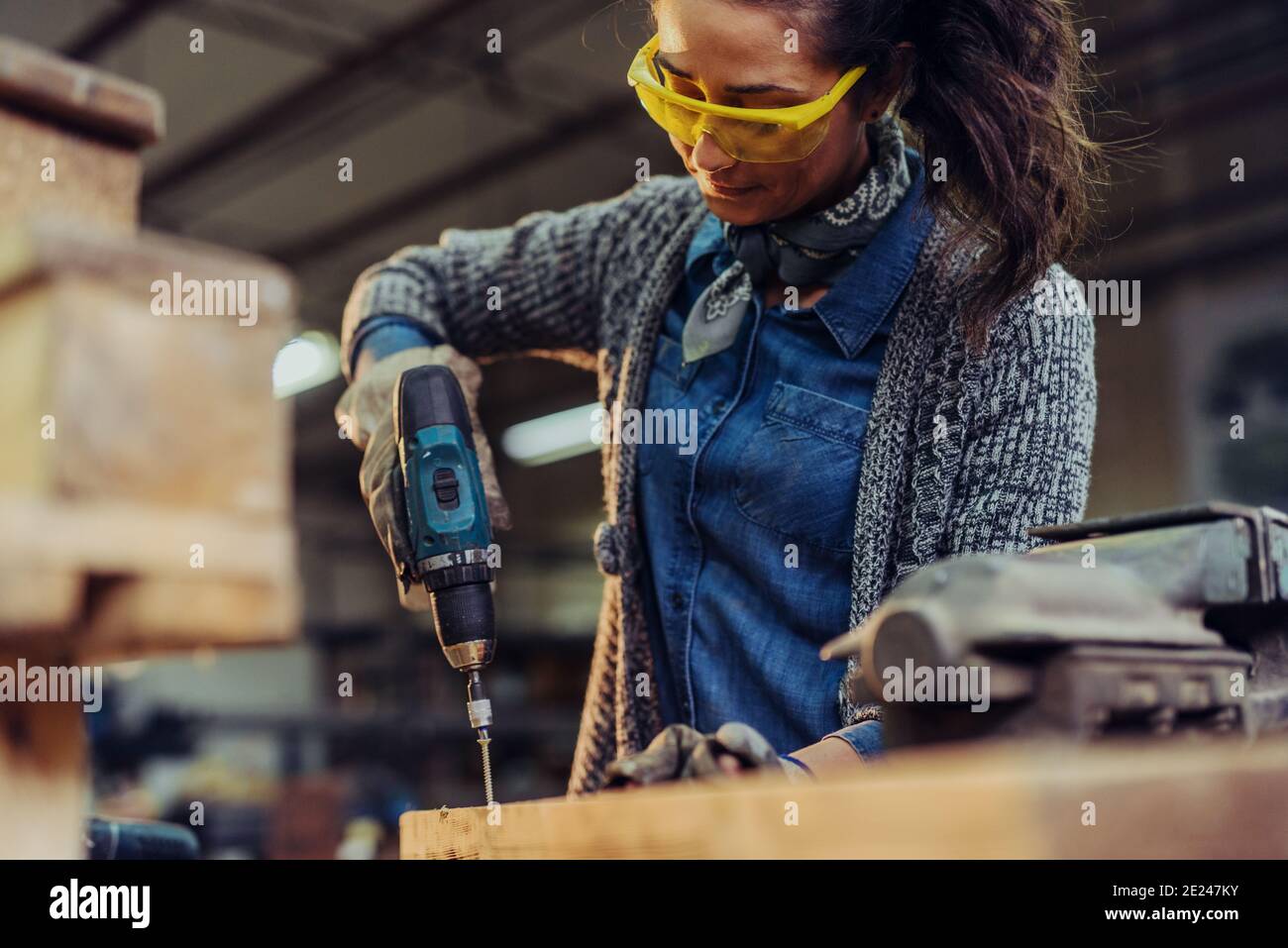 Female carpenter chair hi-res stock photography and images - Alamy