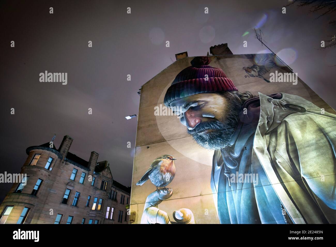 One of Glasgow's best-know murals, by street artist Smug, depicts a ...