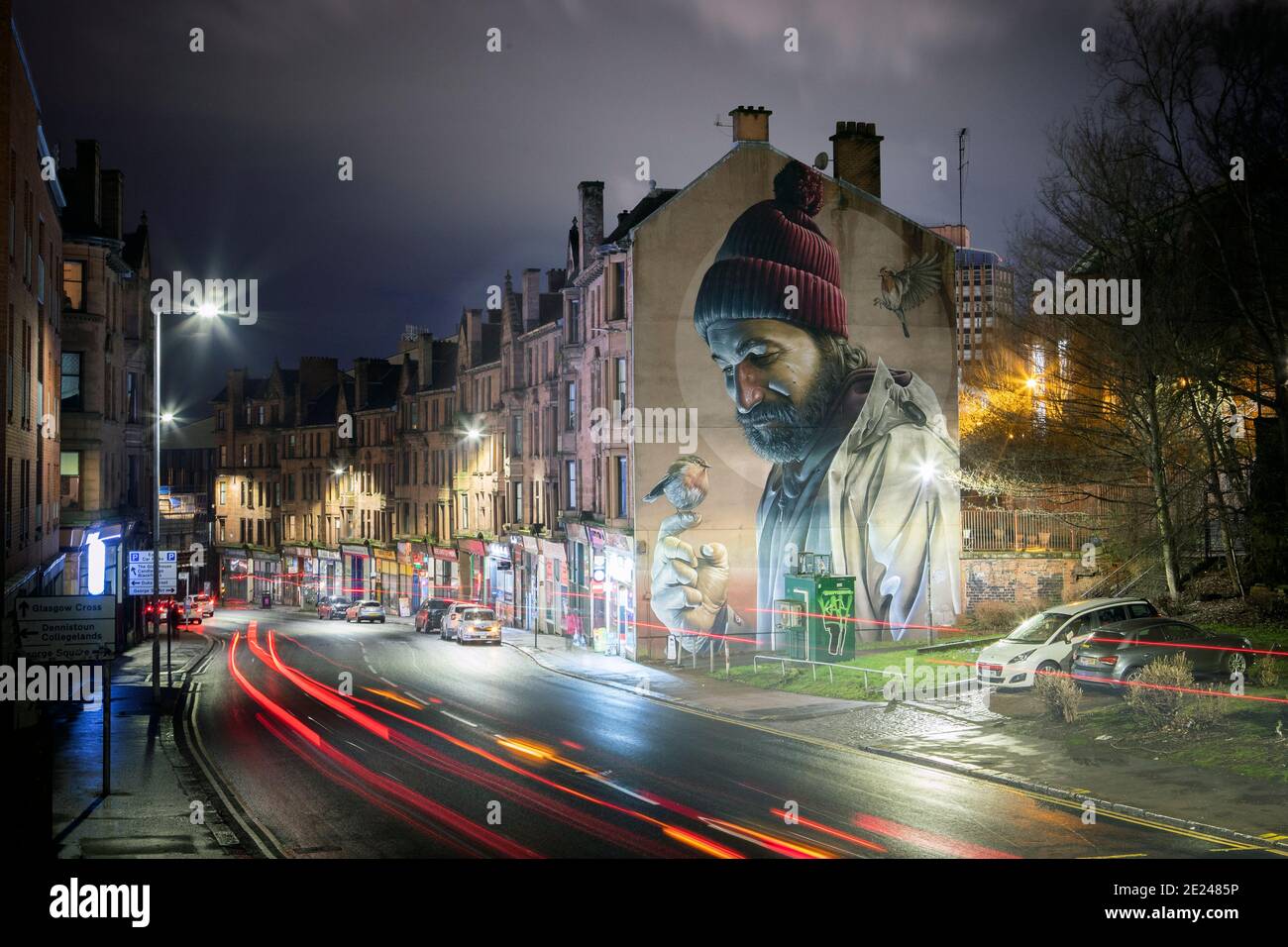 One of Glasgow's best-know murals, by street artist Smug, depicts a ...