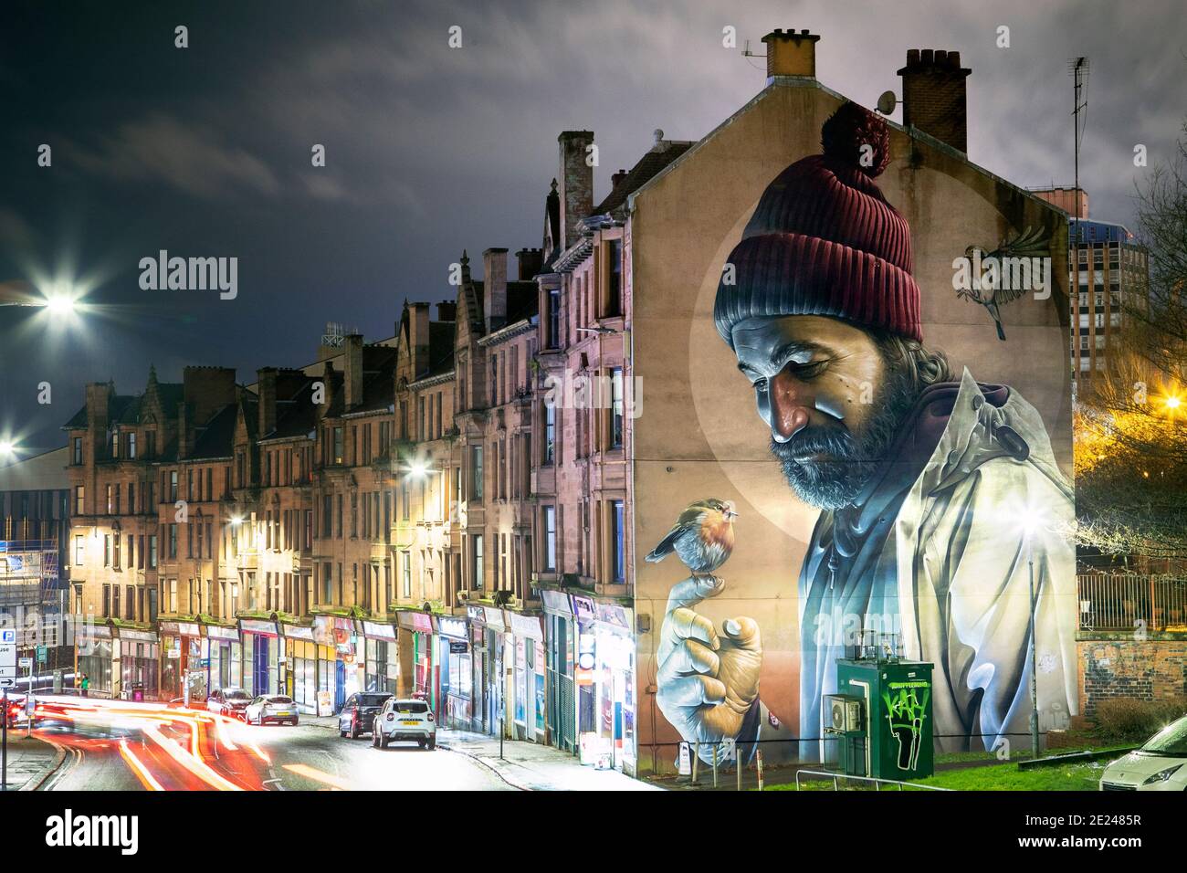 One of Glasgow's best-know murals, by street artist Smug, depicts a ...