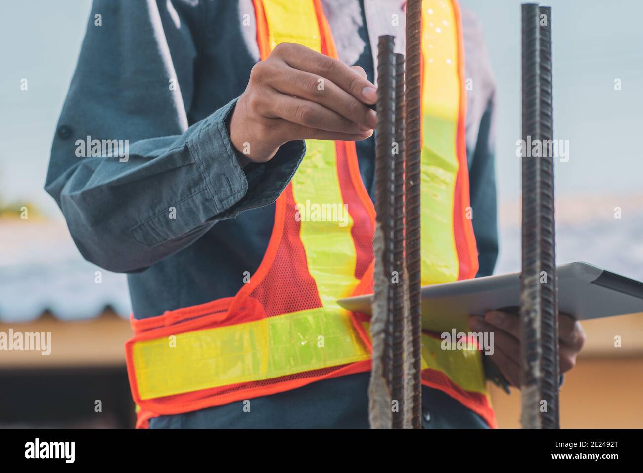 Worker Engineer construction working by tablet technology on site ...