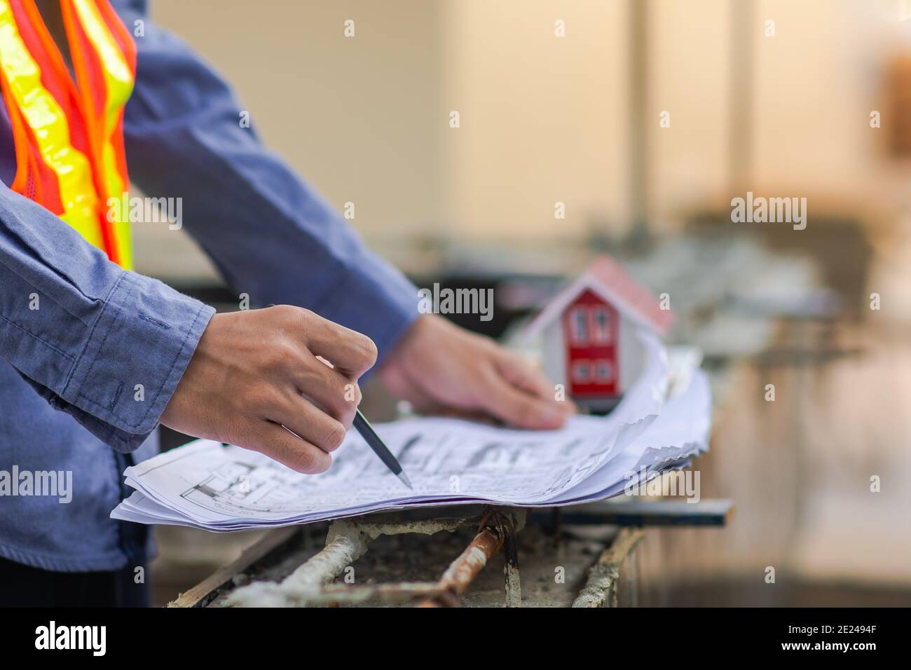 Engineer inspection on site building construction with blueprint Stock ...