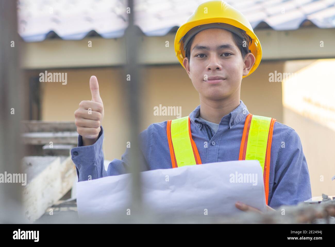 Engineer inspection on site building construction with blueprint Stock ...