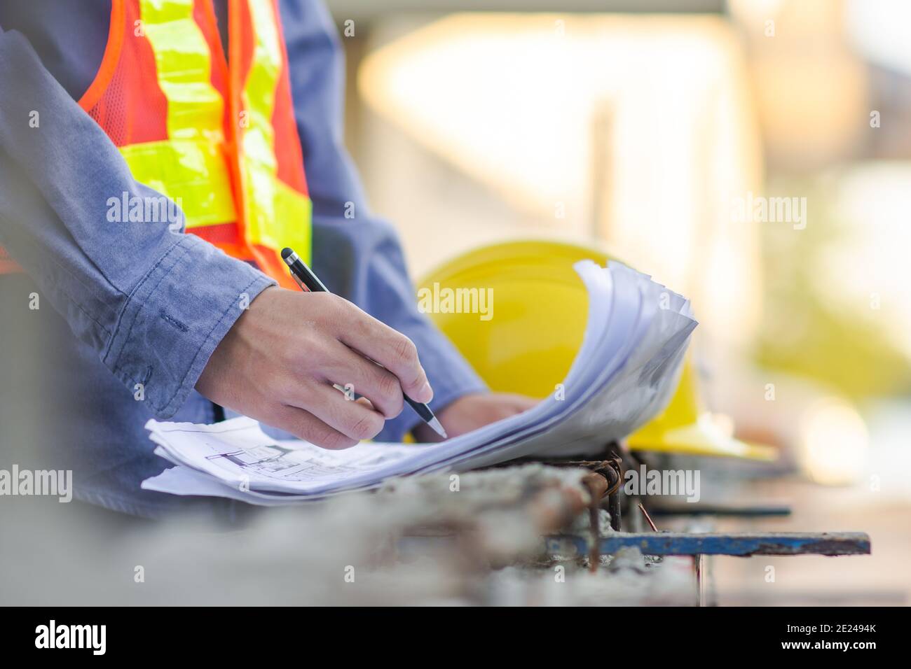 Engineer inspection on site building construction with blueprint Stock ...