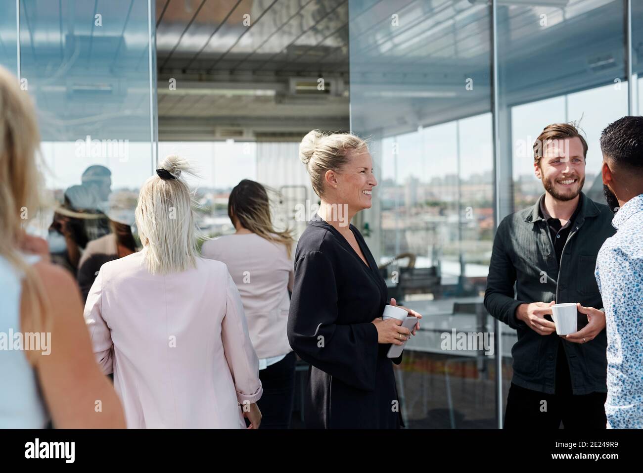 Woman talking during conference hi-res stock photography and images - Alamy