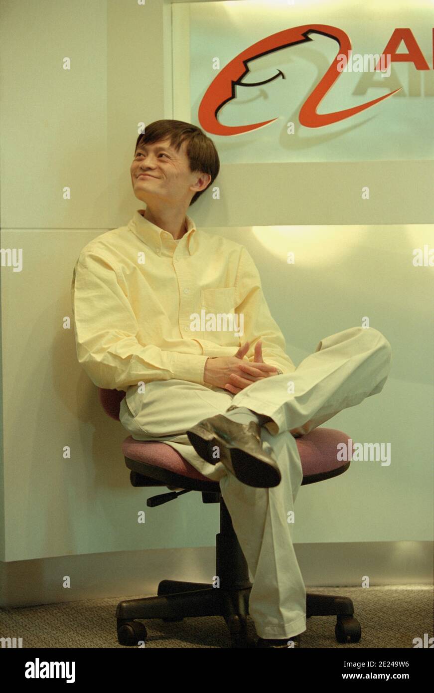 Jack Ma, the co-founder of Alibaba Group, poses in front of the Alibaba ...