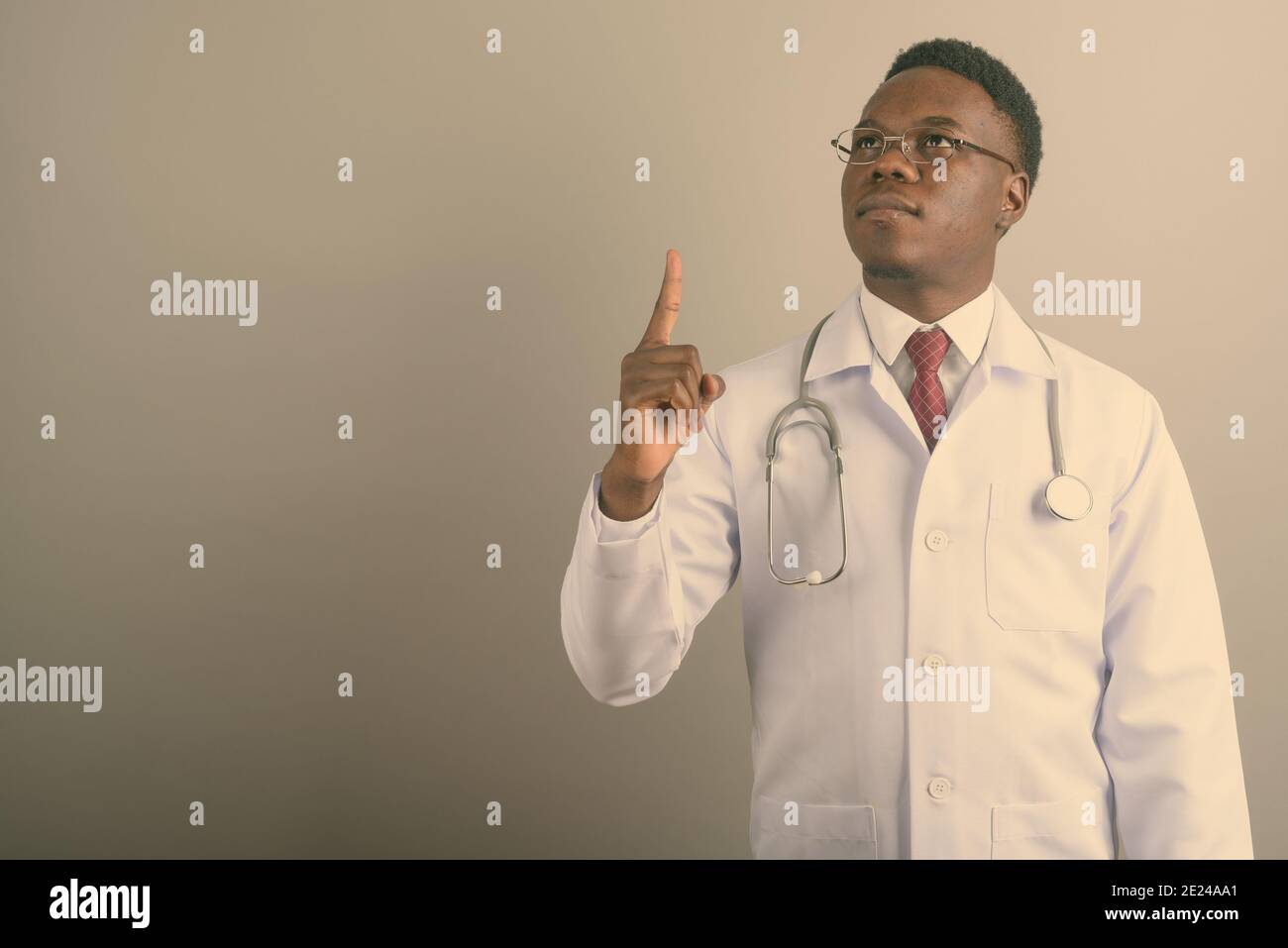 African american doctor looking up hi-res stock photography and images ...