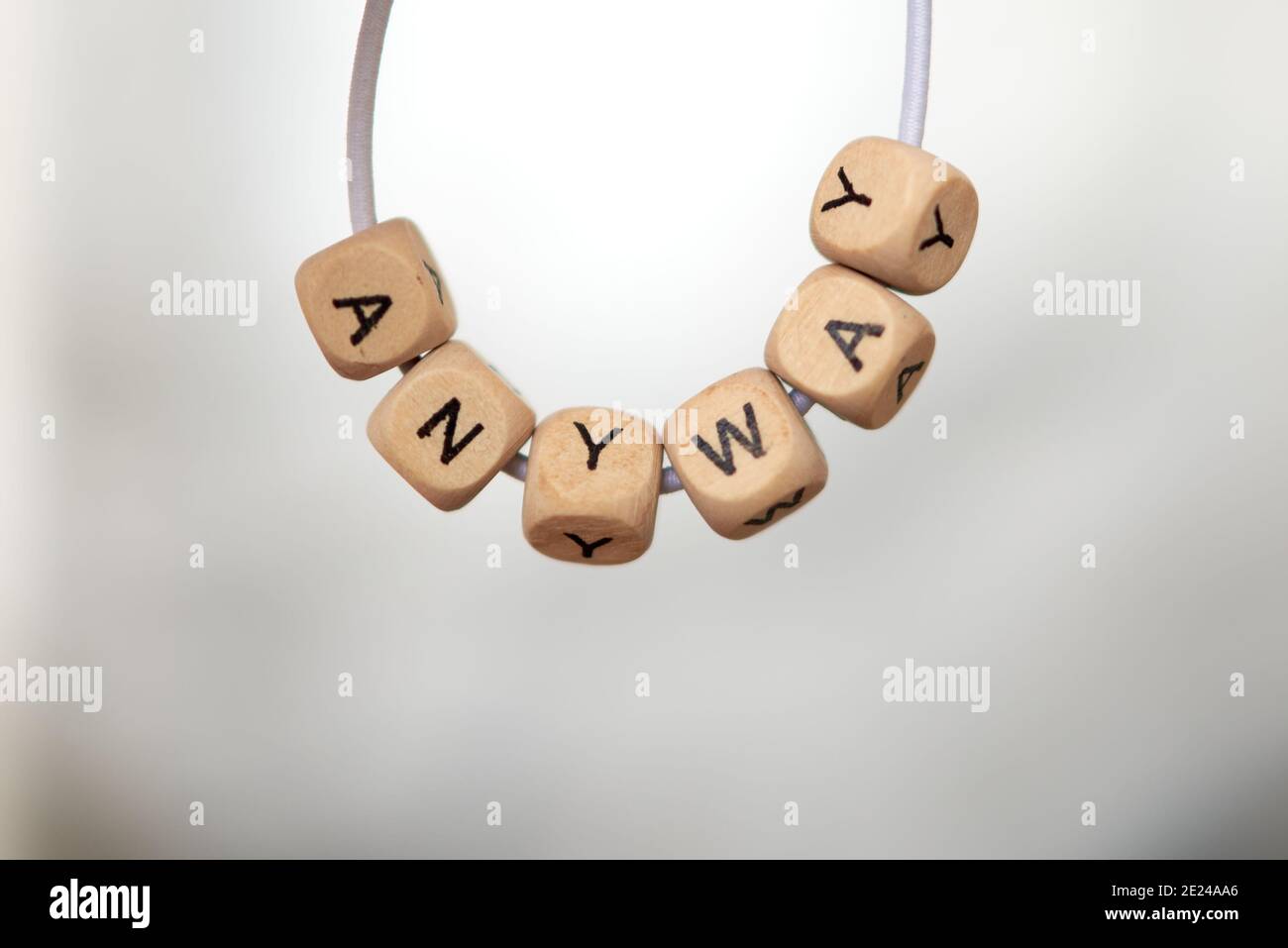 Word accustom lined with wooden cubes Stock Photo - Alamy