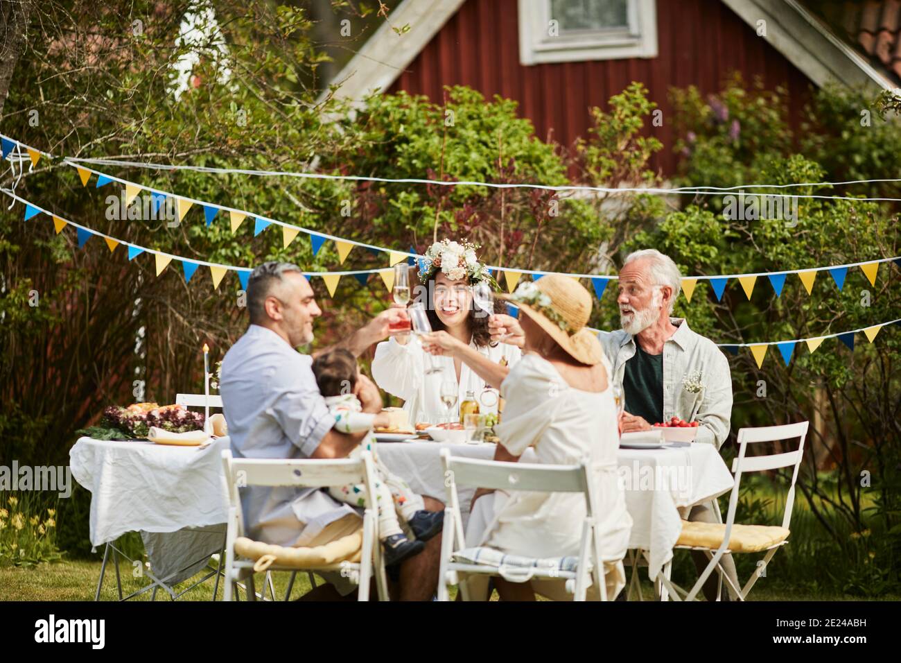 Friends having party in garden Stock Photo - Alamy