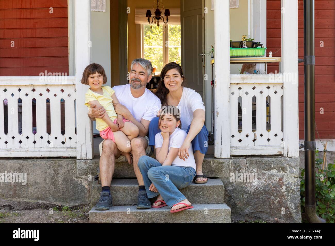 Family father mother two daughters hi-res stock photography and images ...