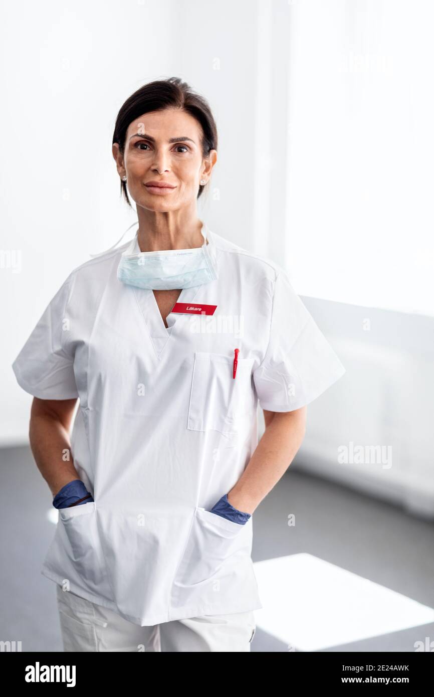 Female doctor looking at camera Stock Photo - Alamy