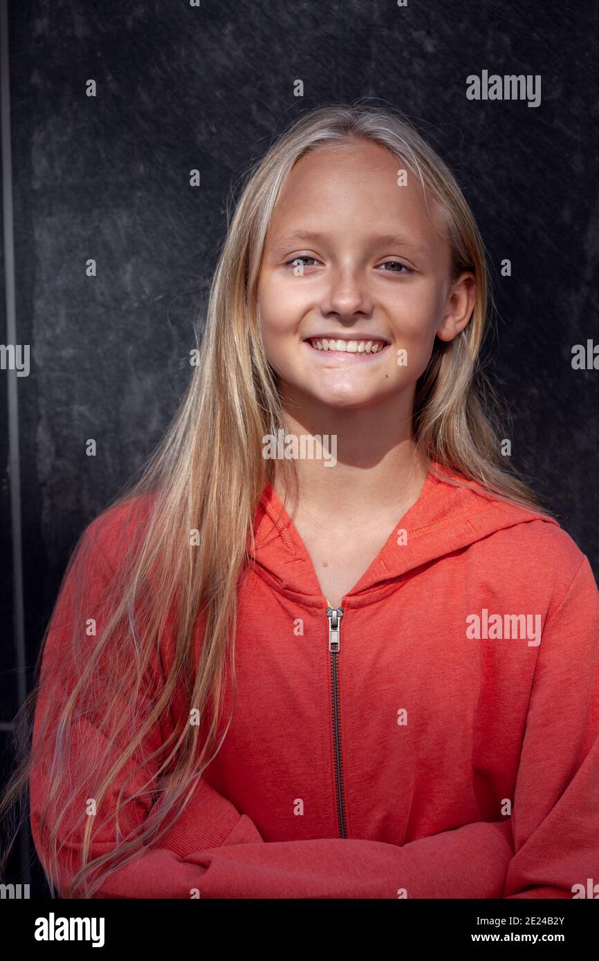 Portrait of girl looking at camera Stock Photo - Alamy