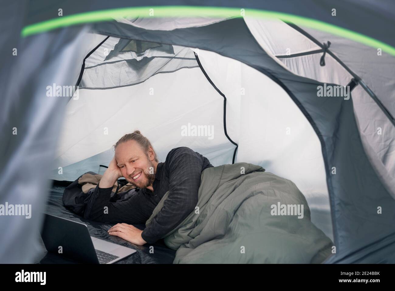 Man Using Laptop Computer Camping High Resolution Stock Photography and ...