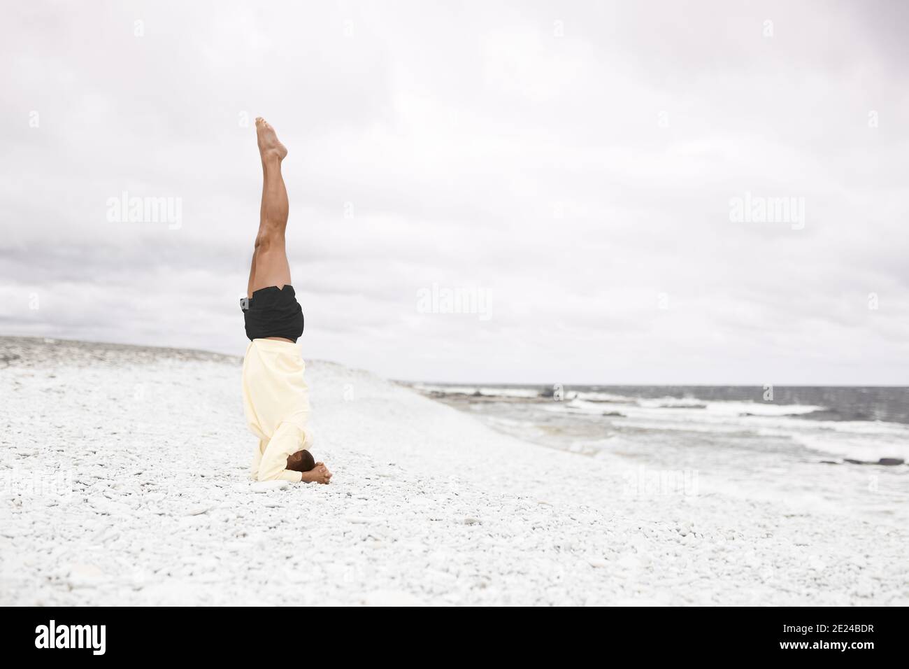 Handstand on beach hi-res stock photography and images - Alamy