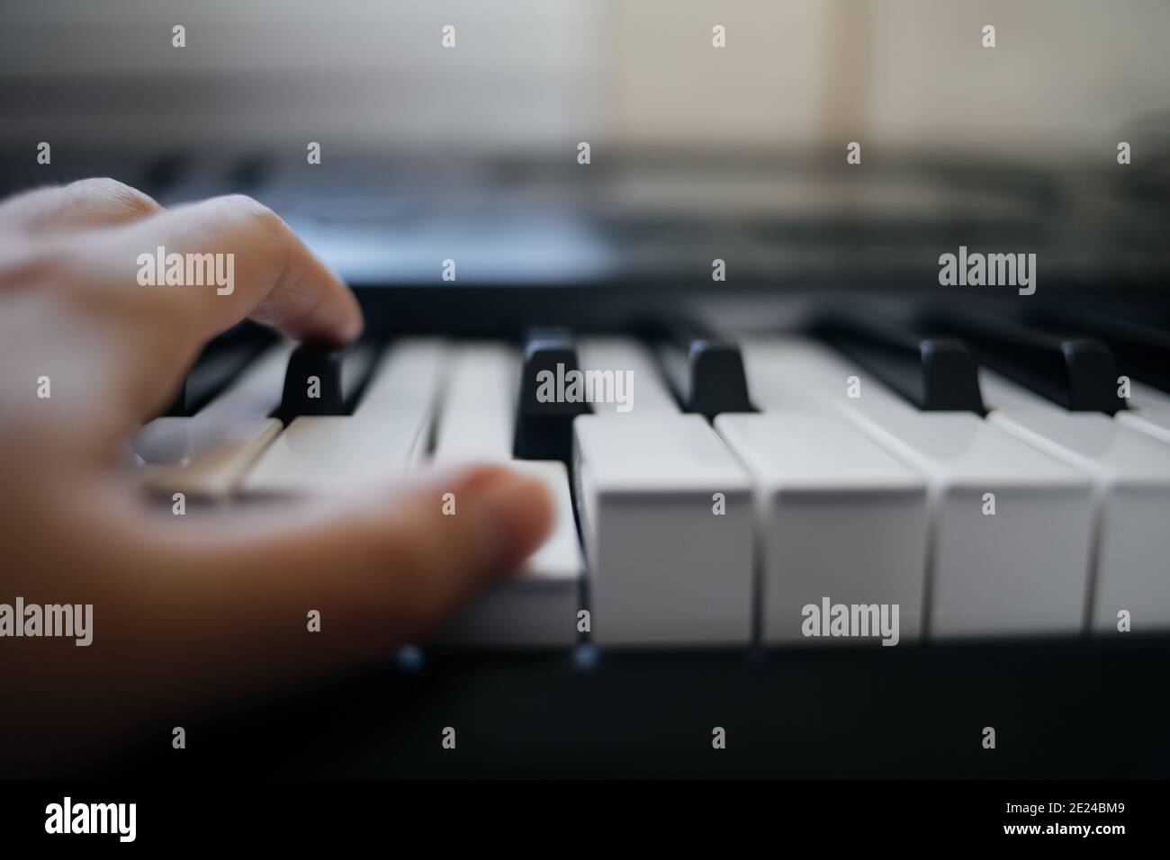 Close up fingers of pianist playing a home keyboard piano Stock Photo ...