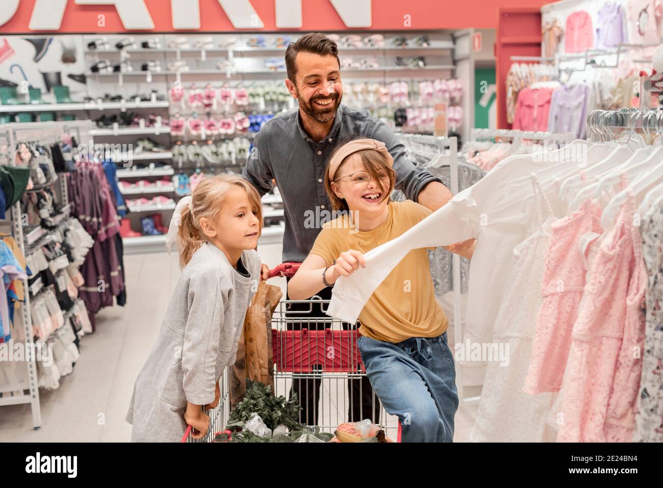 Shopping clothes in supermarket man hi-res stock photography and images ...