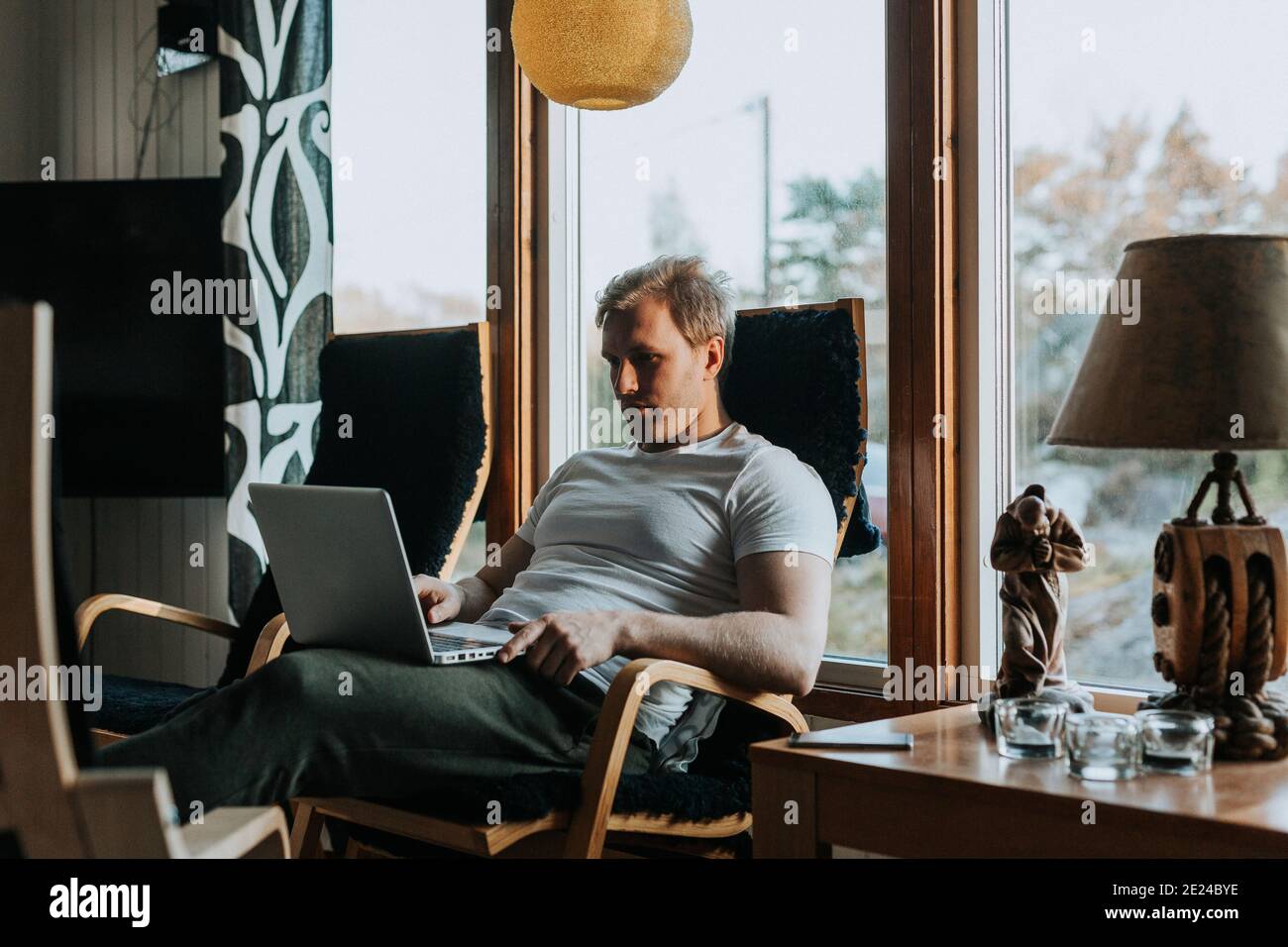 Man on chair hi-res stock photography and images - Alamy