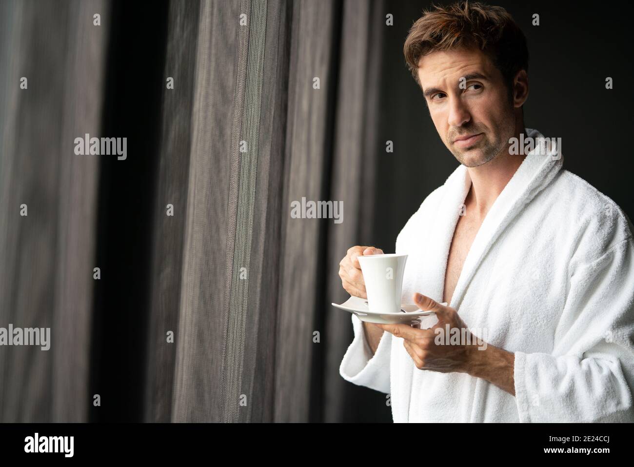 Handsome man in robe hi-res stock photography and images - Alamy