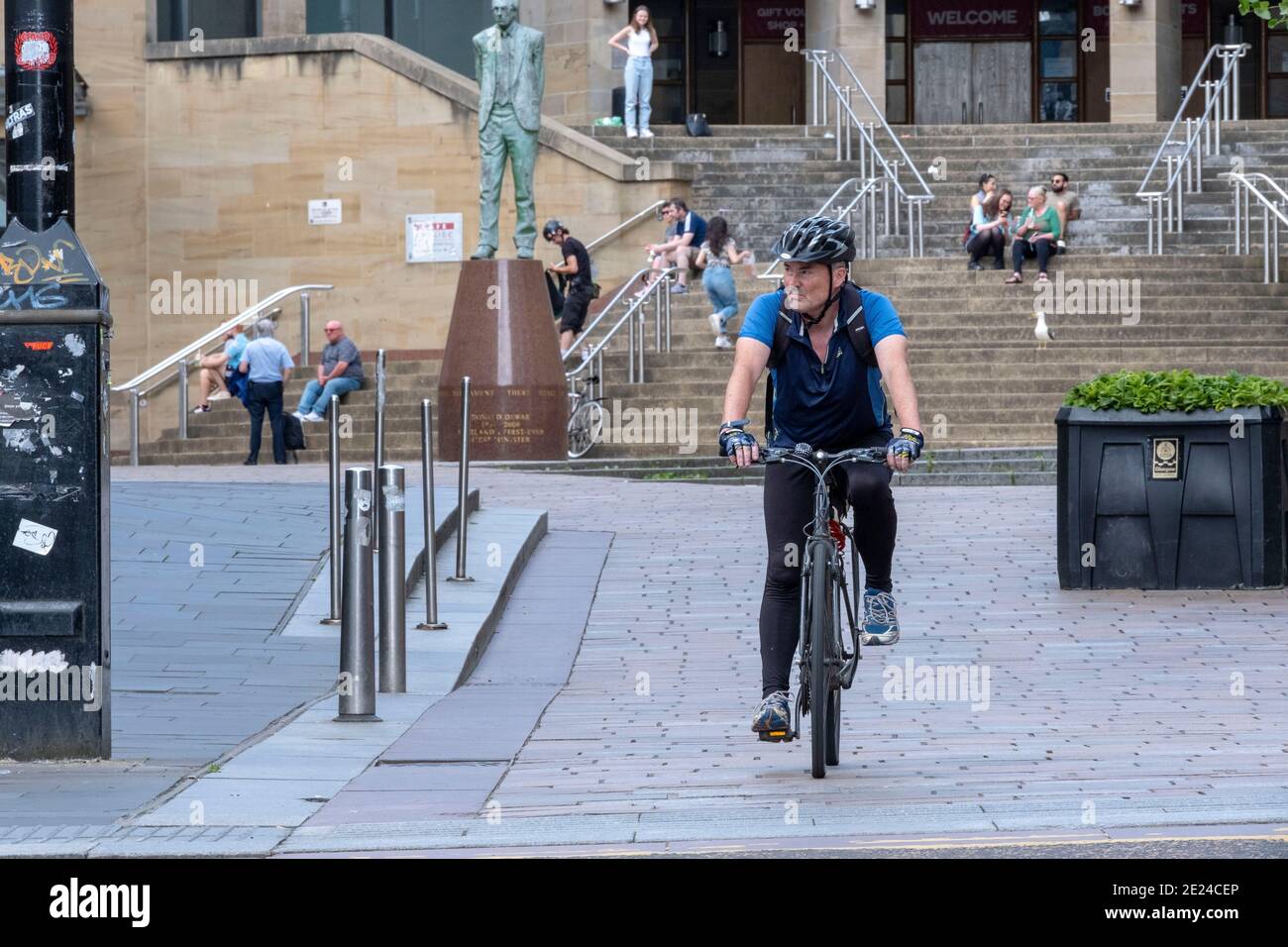 People cycling along roads and pathways hi-res stock photography and ...