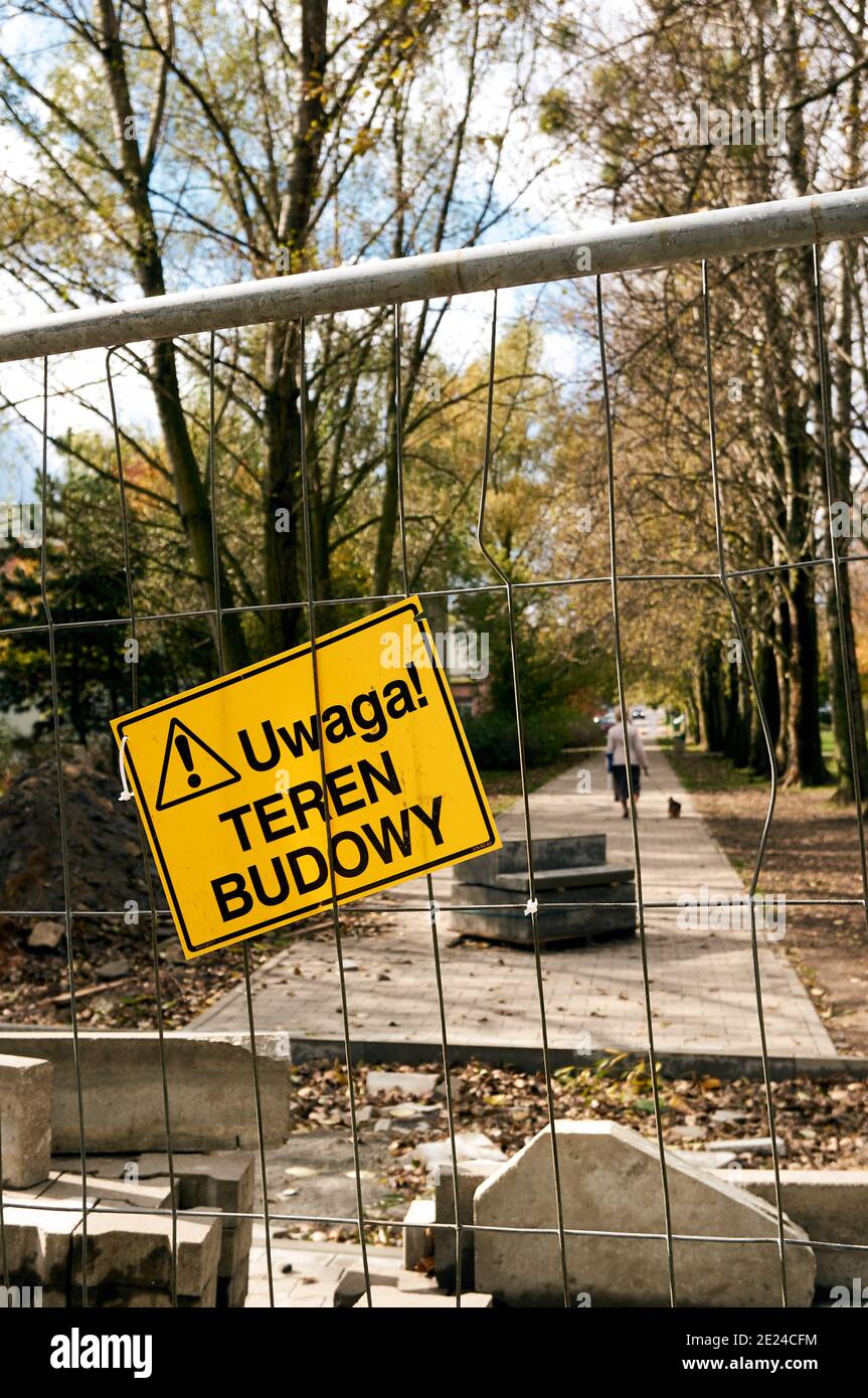 POZNAN, POLAND - Oct 08, 2017: Yellow Polish warning sign on a metal ...