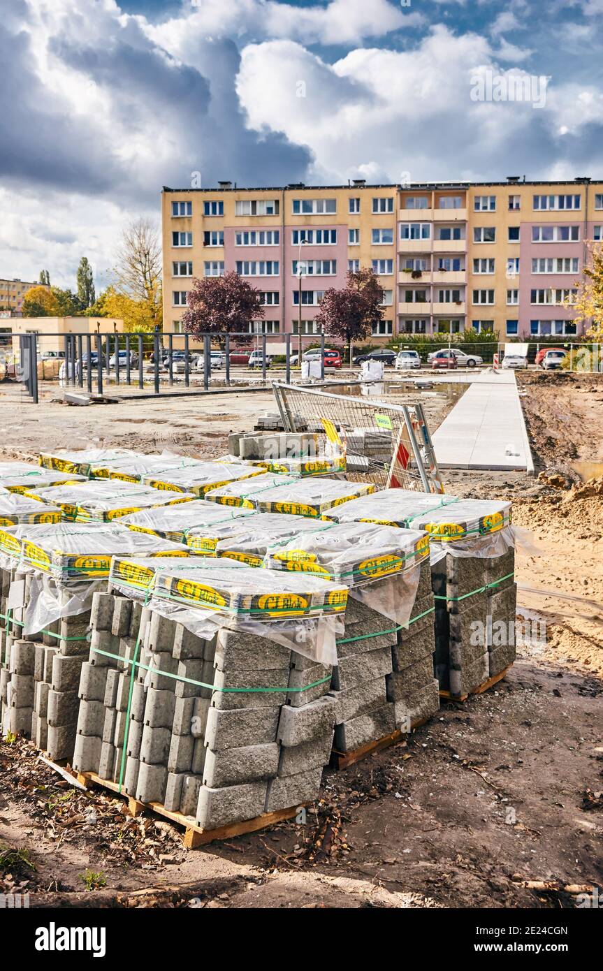 POZNAN, POLAND - Oct 08, 2017: Stacked stone bricks on a construction ...