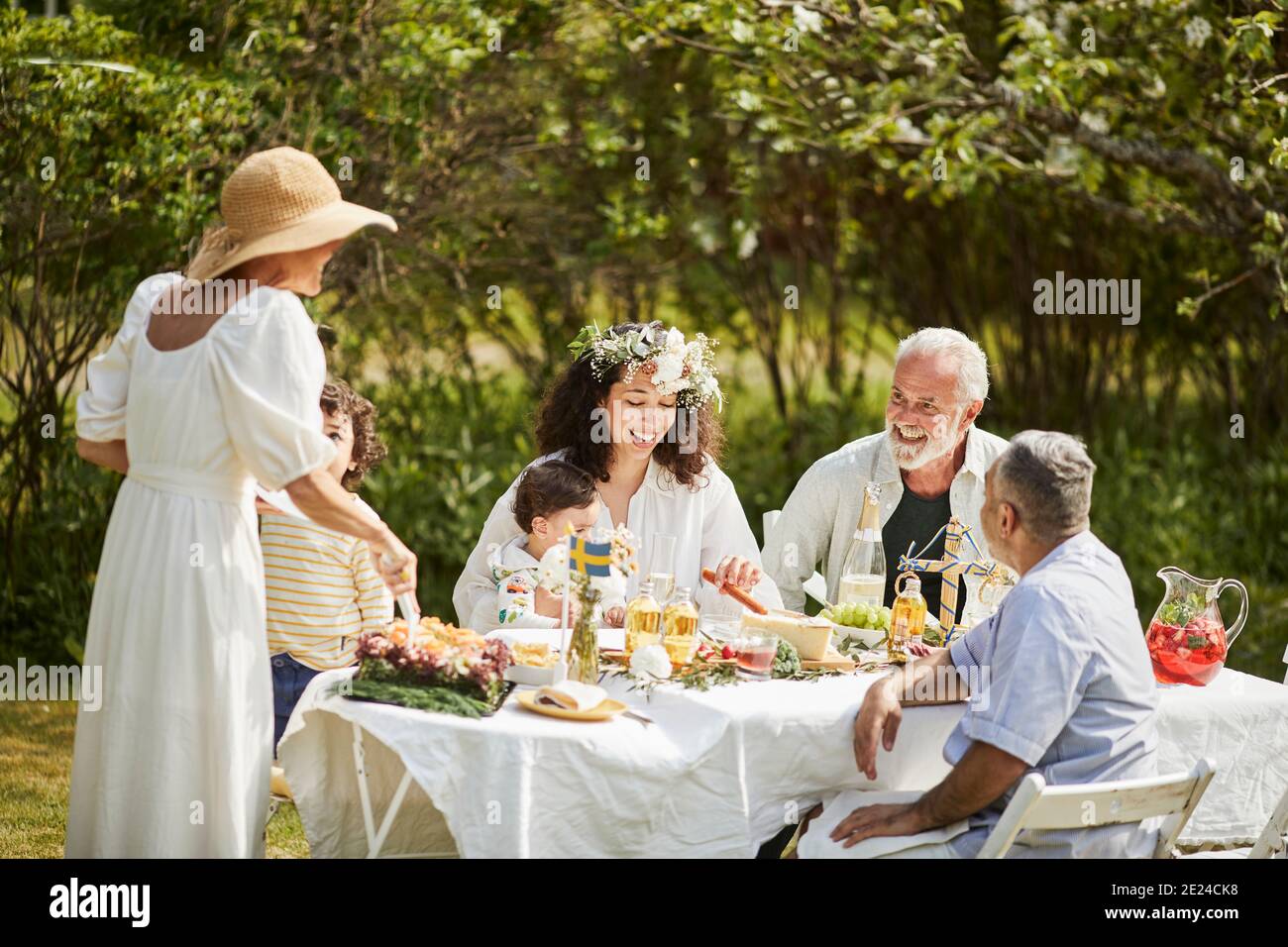 Friends having party in garden Stock Photo - Alamy