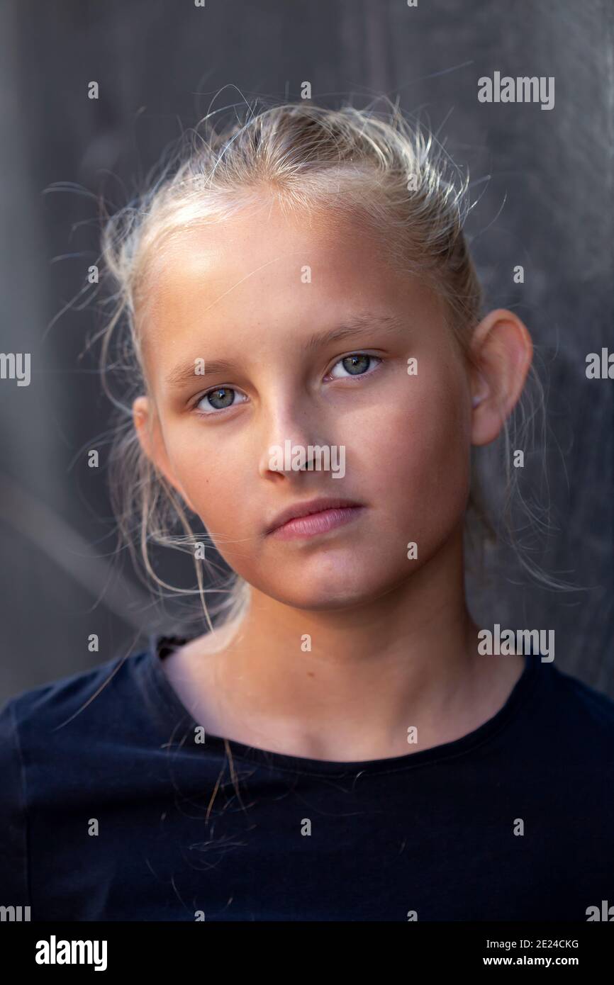 Portrait of girl looking at camera Stock Photo - Alamy