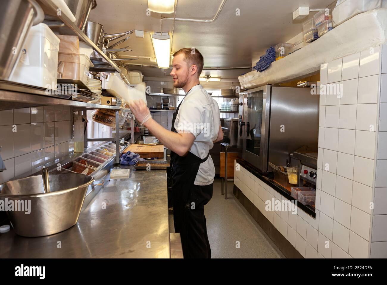 Restaurant worker chef hi-res stock photography and images - Alamy