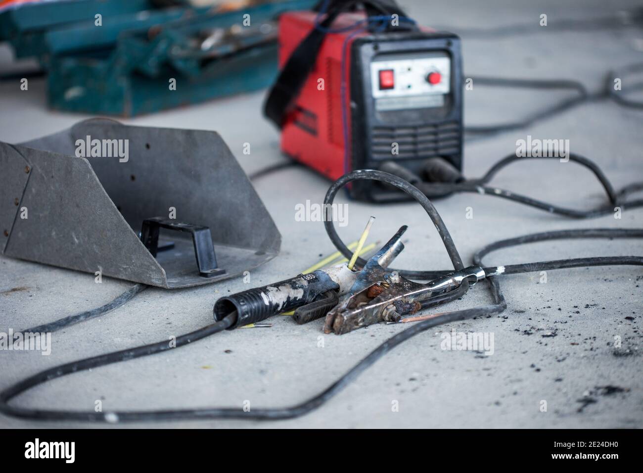 Set of an inverter welding machine with a welding shield, welding ...