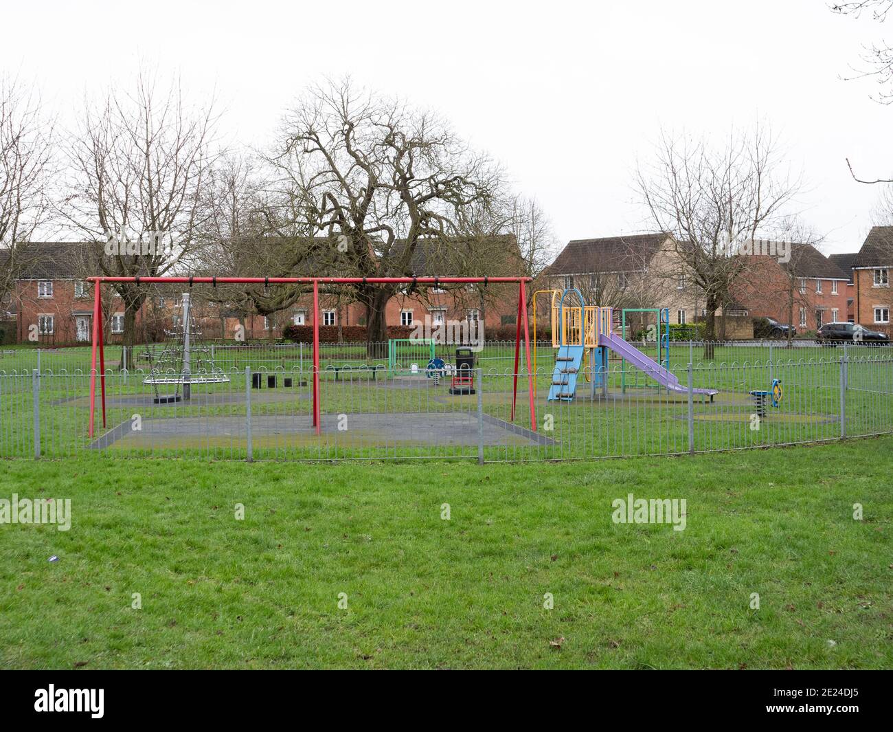 A deserted children's playground on a dull, overcast day on Leigh Park ...
