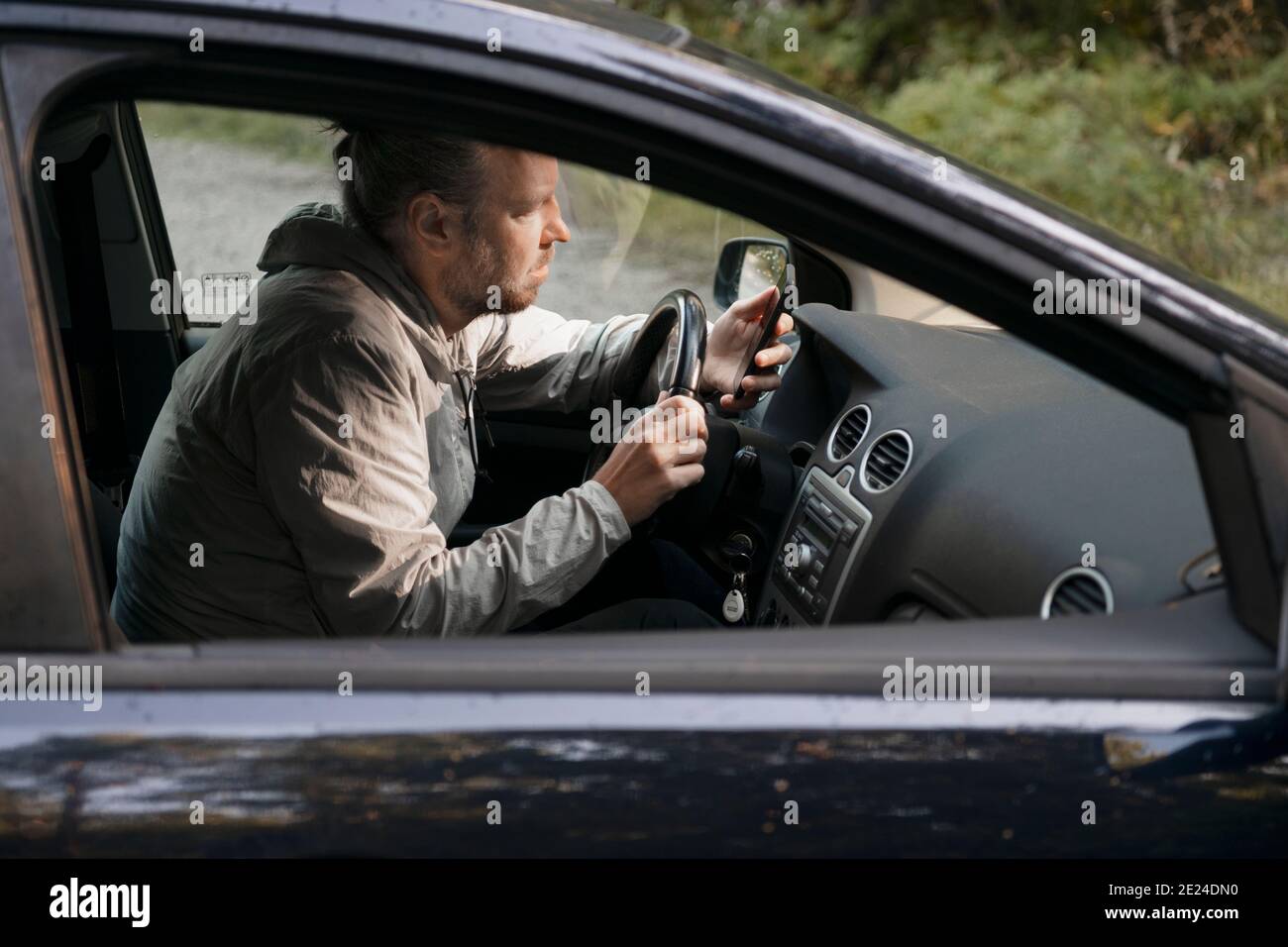 Man driving car Stock Photo - Alamy