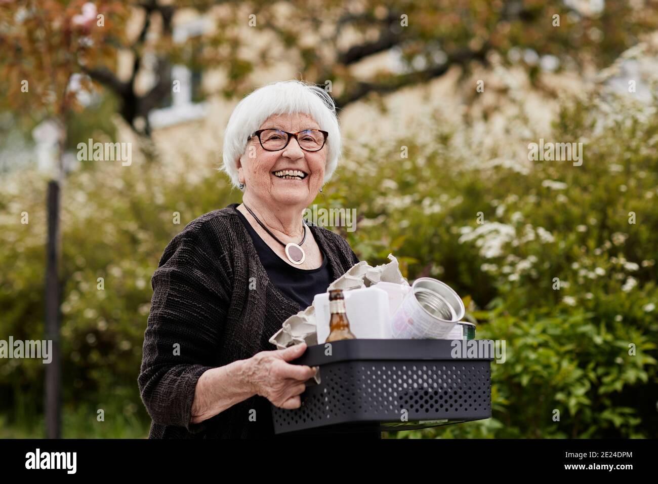 Waste carrying people hi-res stock photography and images - Alamy