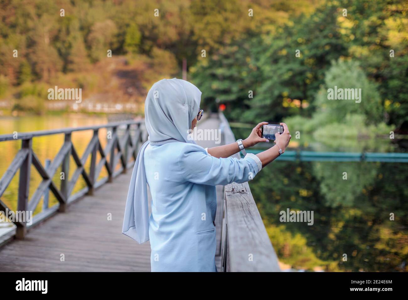 Woman on bridge hi-res stock photography and images - Alamy