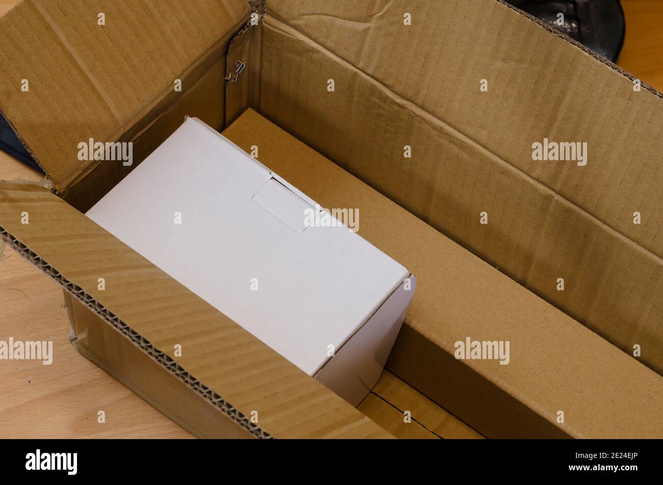 Online shopping delivery service concept. Opened Rectangular cardboard ...