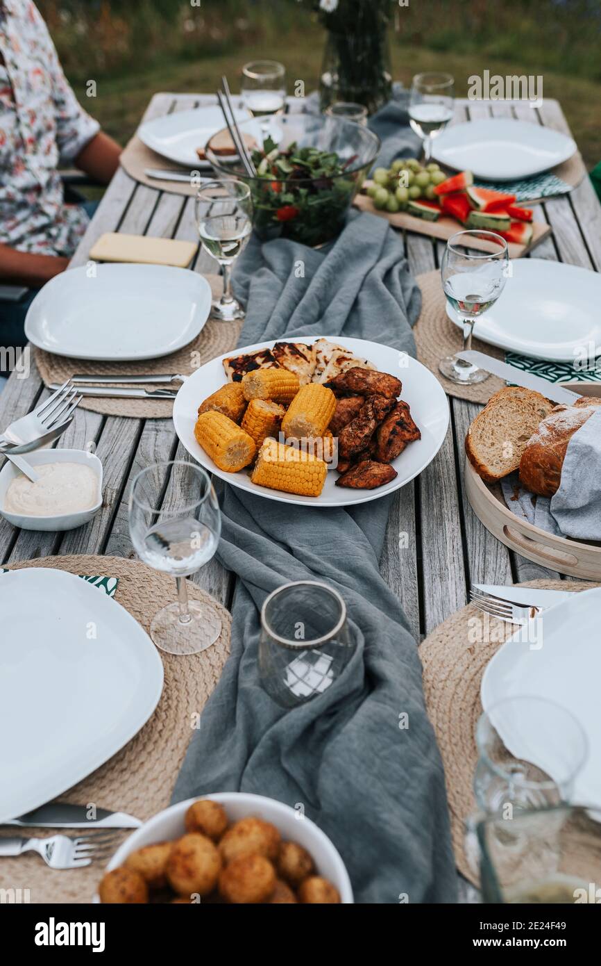 Food on table in garden Stock Photo - Alamy