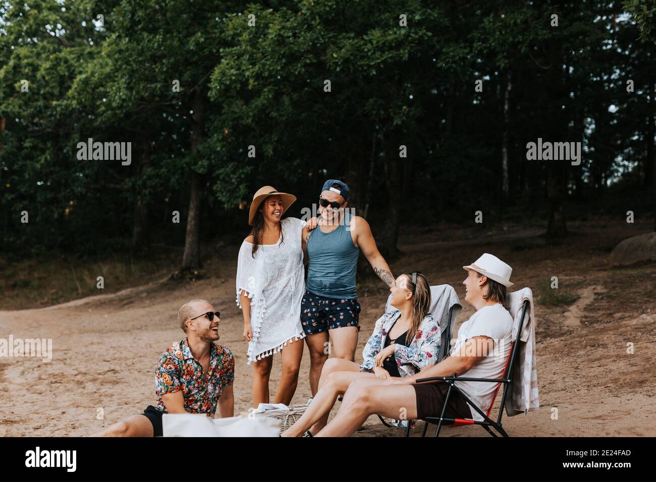 Happy friends relaxing together Stock Photo - Alamy