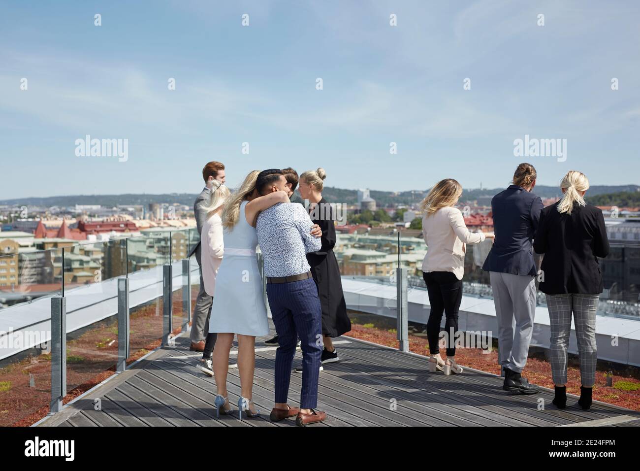 People looking at view from terrace Stock Photo - Alamy