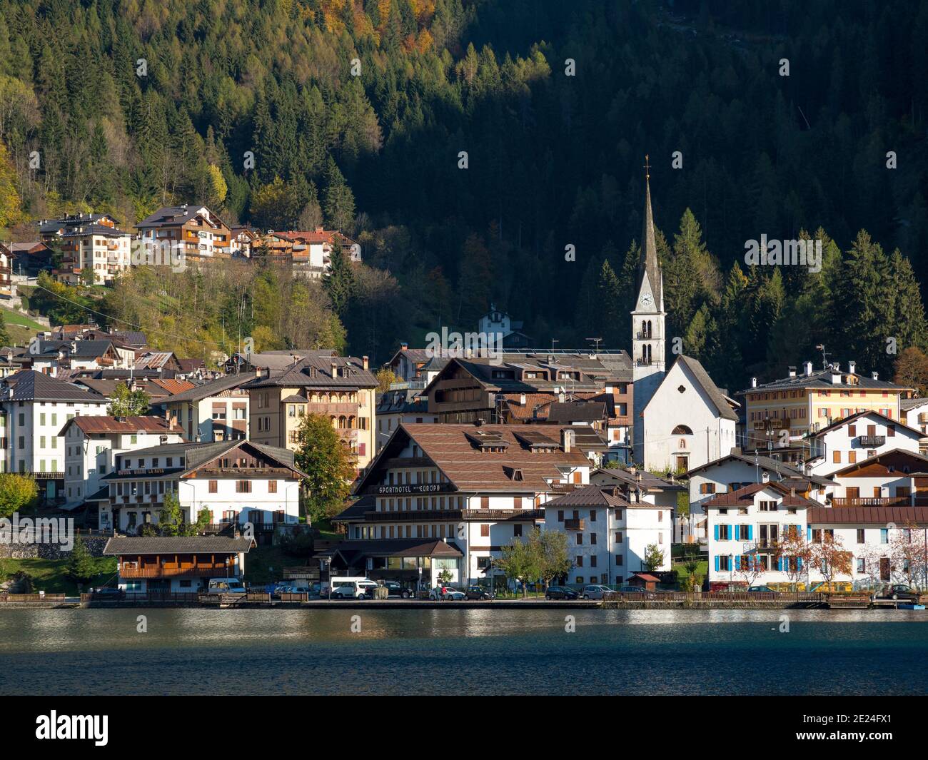 Alleghe at Lago di Alleghe under the peak of Civetta, an icon of the ...