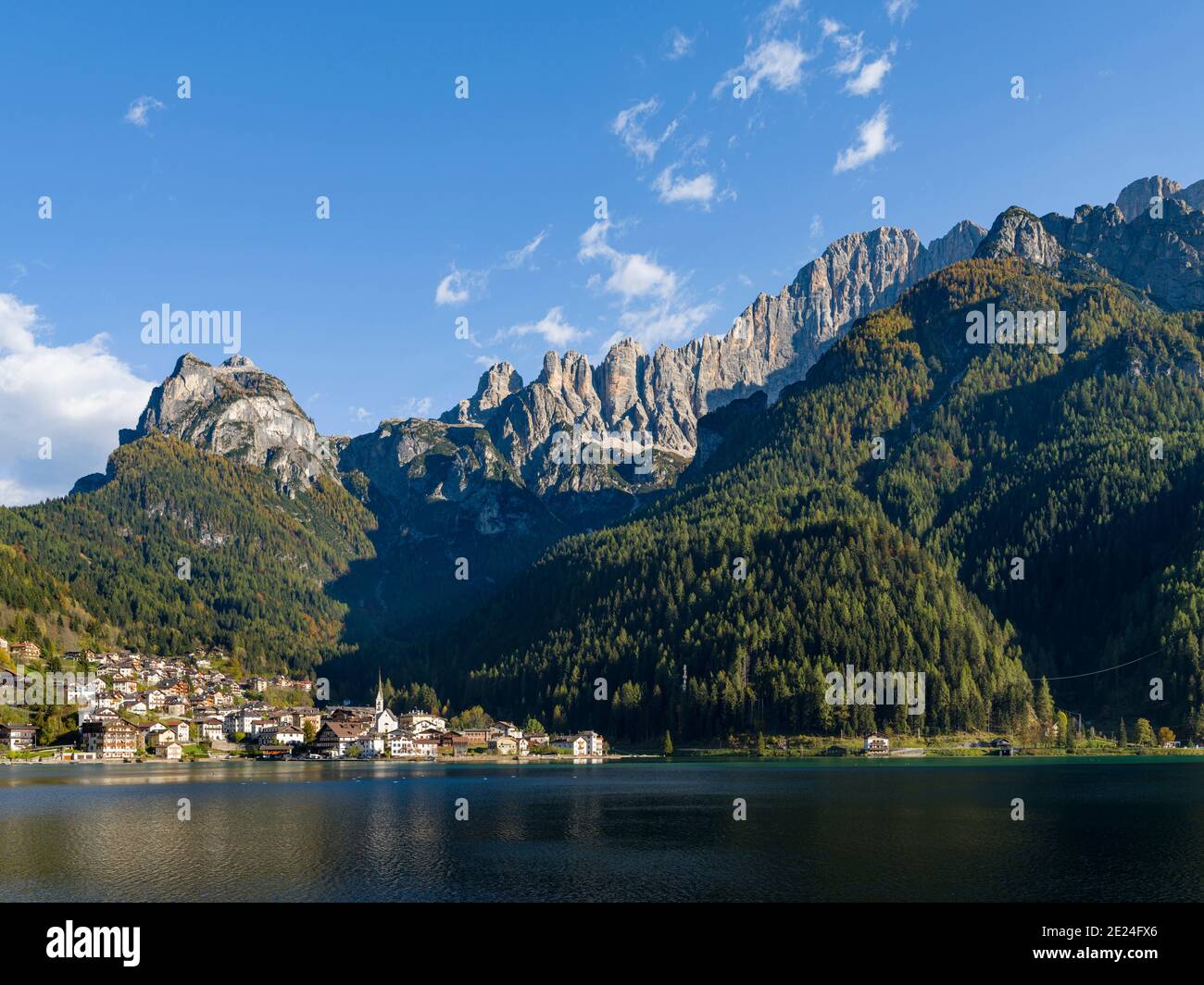 Alleghe at Lago di Alleghe under the peak of Civetta, an icon of the ...