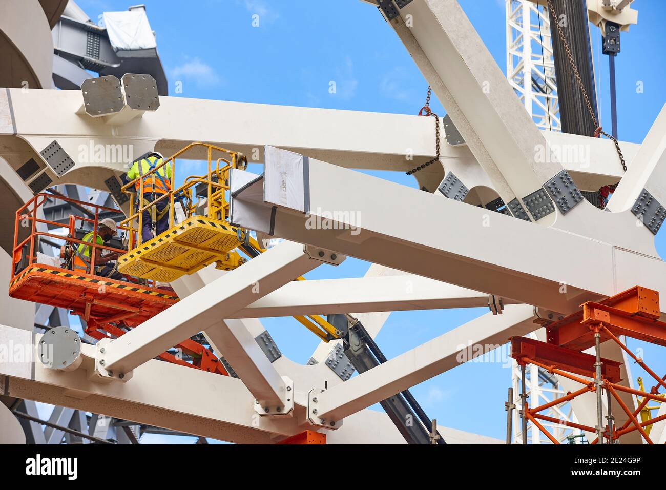 Workers on a construction site. Engineering and architectural workplace ...