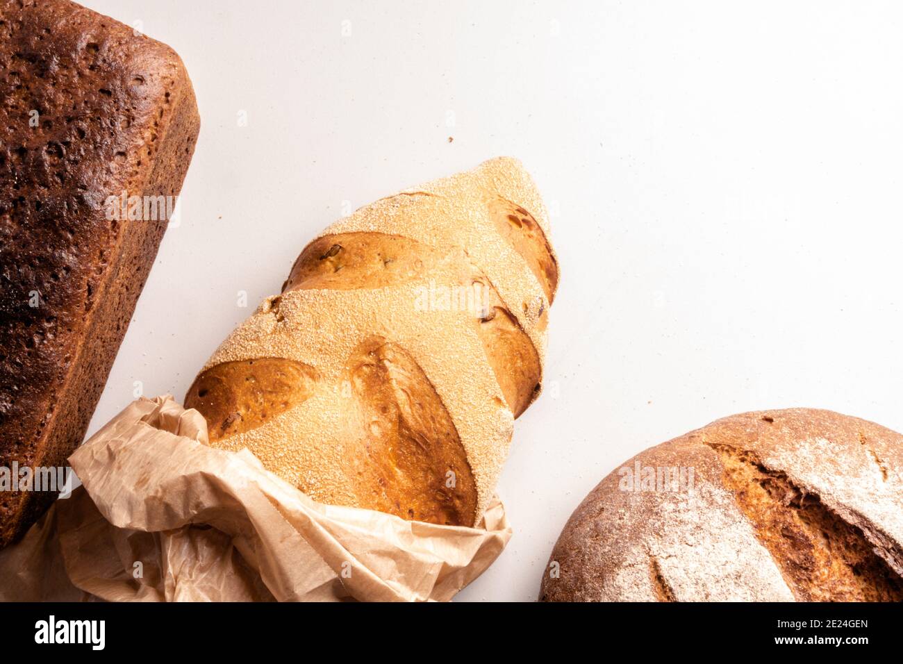 Mixed whole grain health breads with flour isolated on white background ...