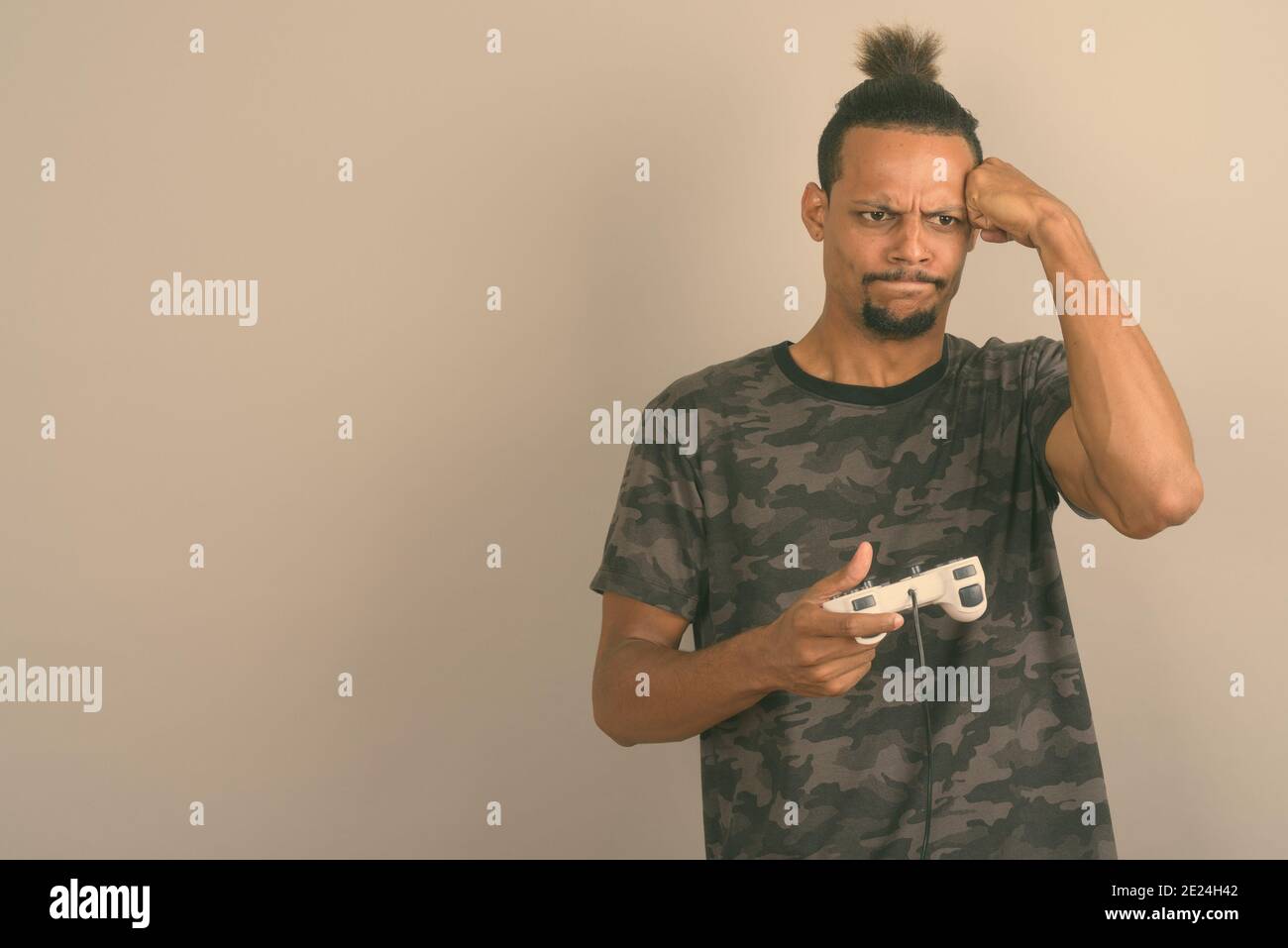 Serious bearded gamer tired hi-res stock photography and images - Alamy
